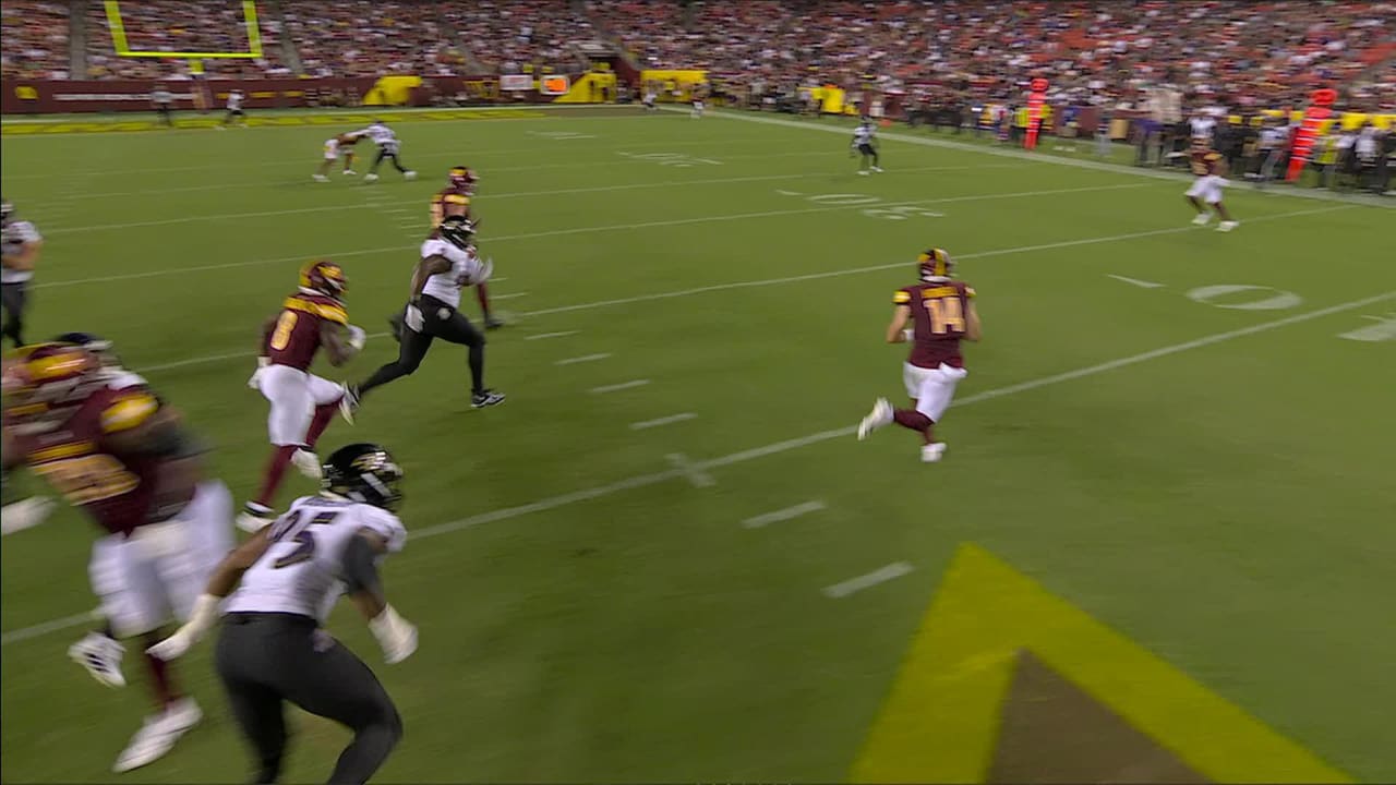 Washington Commanders quarterback Sam Howell escapes slew of deenders ...