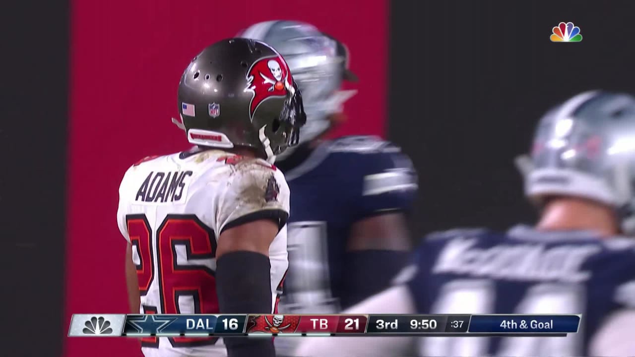 Tampa Bay Buccaneers defensive back Andrew Adams sidesteps block for an ...
