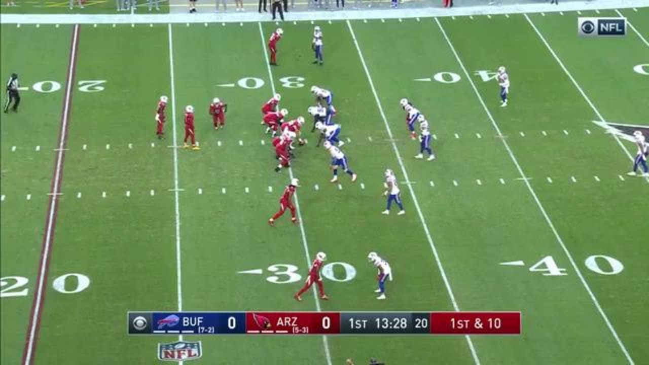 Arizona Cardinals running back Chase Edmonds squeezes through hole for ...