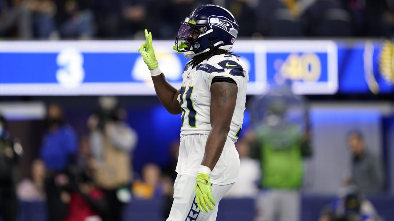 Seattle Seahawks running back DeeJay Dallas keeps legs churning to ...