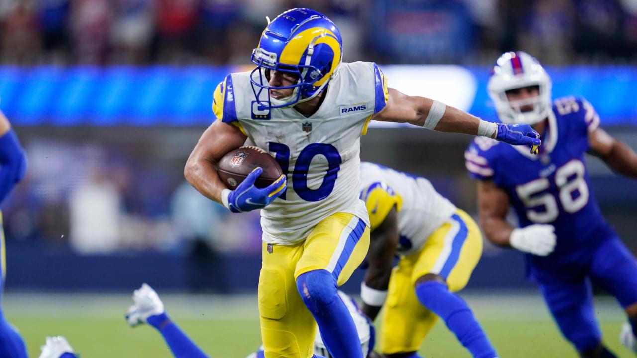 Los Angeles Rams wide receiver Cooper Kupp stiff-arms his way above 100 yards receiving on 28 ...