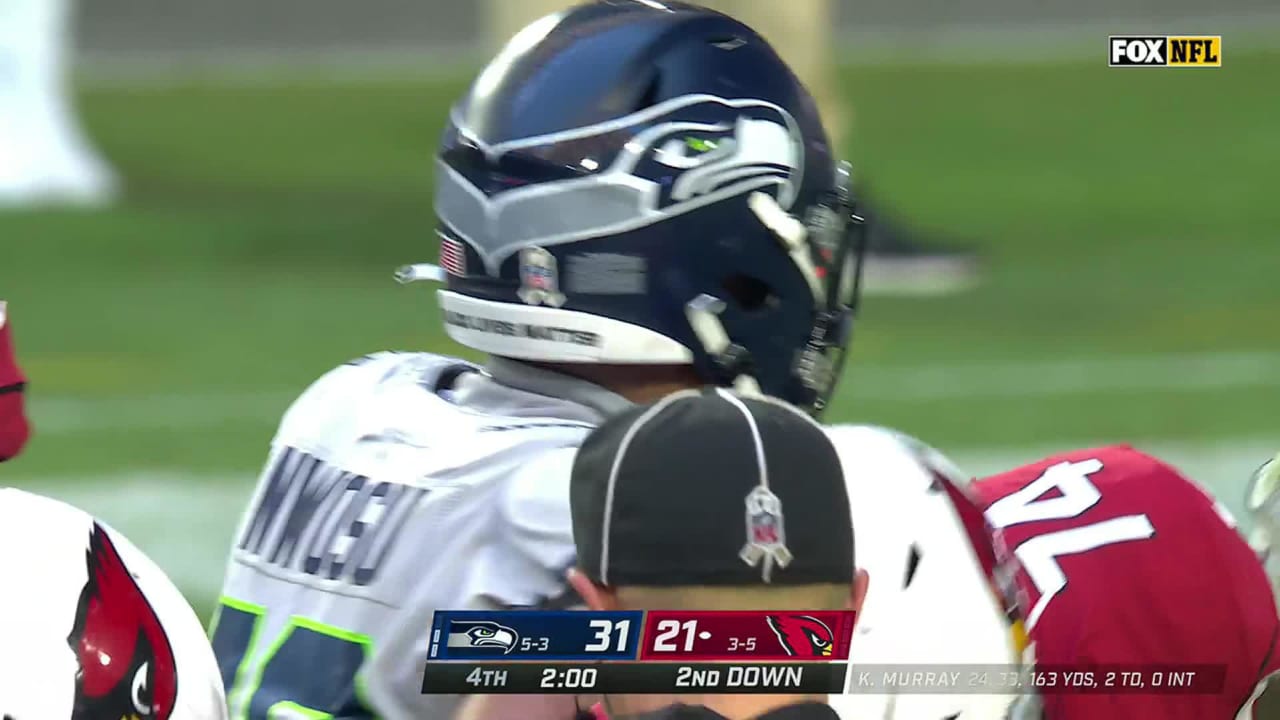 Seattle Seahawks linebacker Uchenna Nwosu powers his way toward Arizona ...