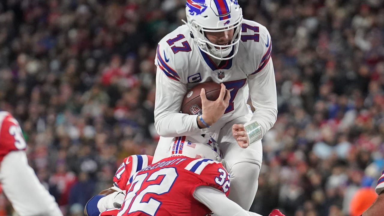 Buffalo Bills quarterback Josh Allen goes airborne on 8-yard run in red ...