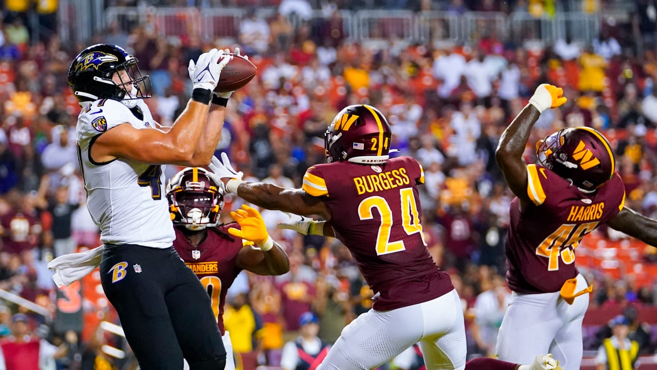 Baltimore Ravens tight end Travis Vokolek powers through multiple ...