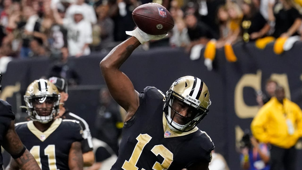 New Orleans Saints wide receiver Michael Thomas flexes muscles after ...
