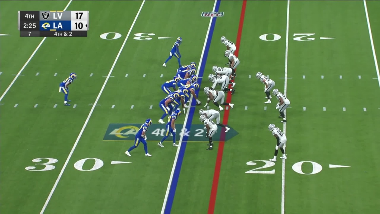 Los Angeles Rams quarterback Bryce Perkins races to the edge to convert ...