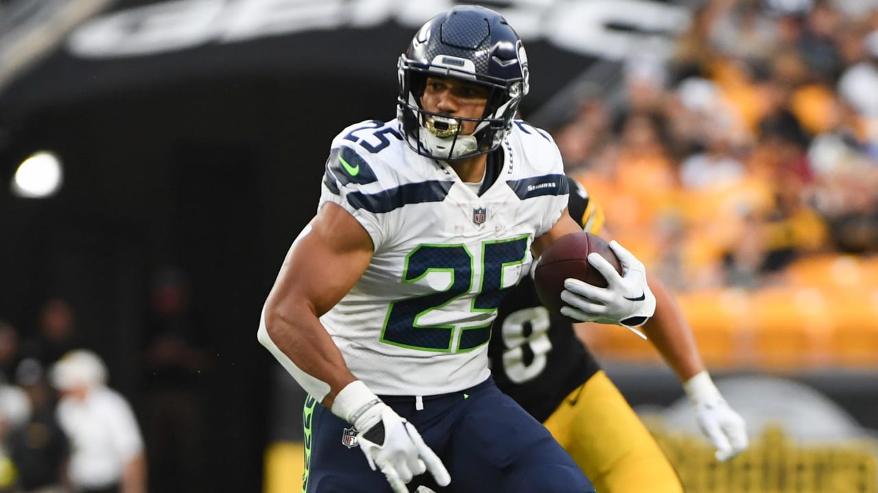 Seattle Seahawks running back Travis Homer cuts back inside for a 16 ...