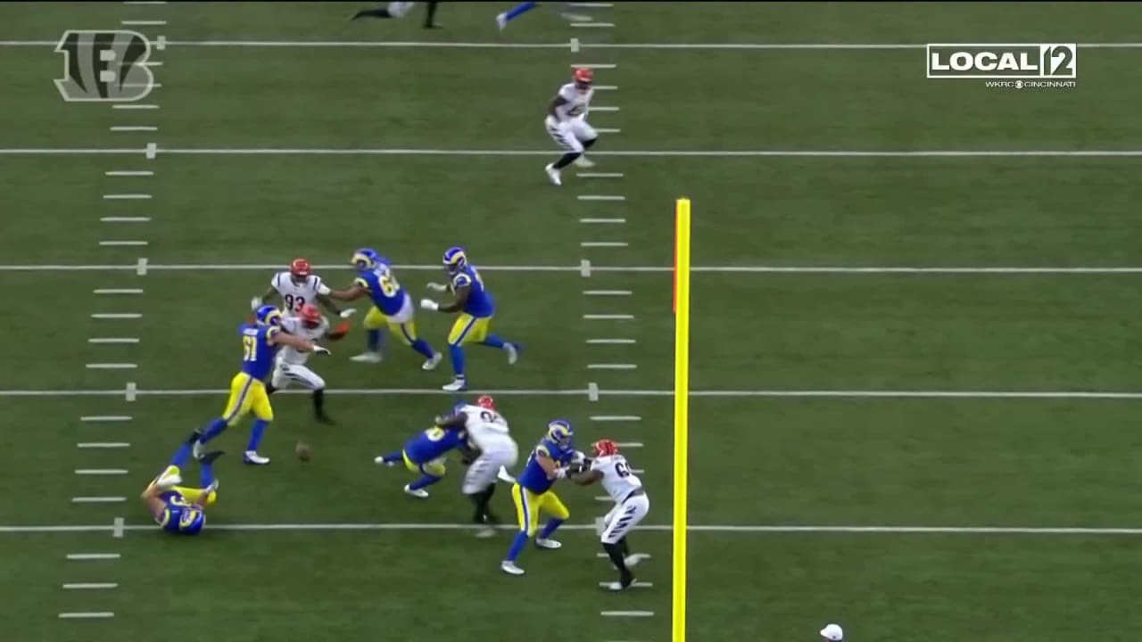 Cincinnati Bengals defensive tackle Zachary Carter swims toward a strip ...