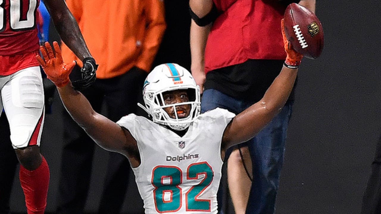 Francis Owusu jumps up to catch a 14-yard touchdown from Brock Osweiler