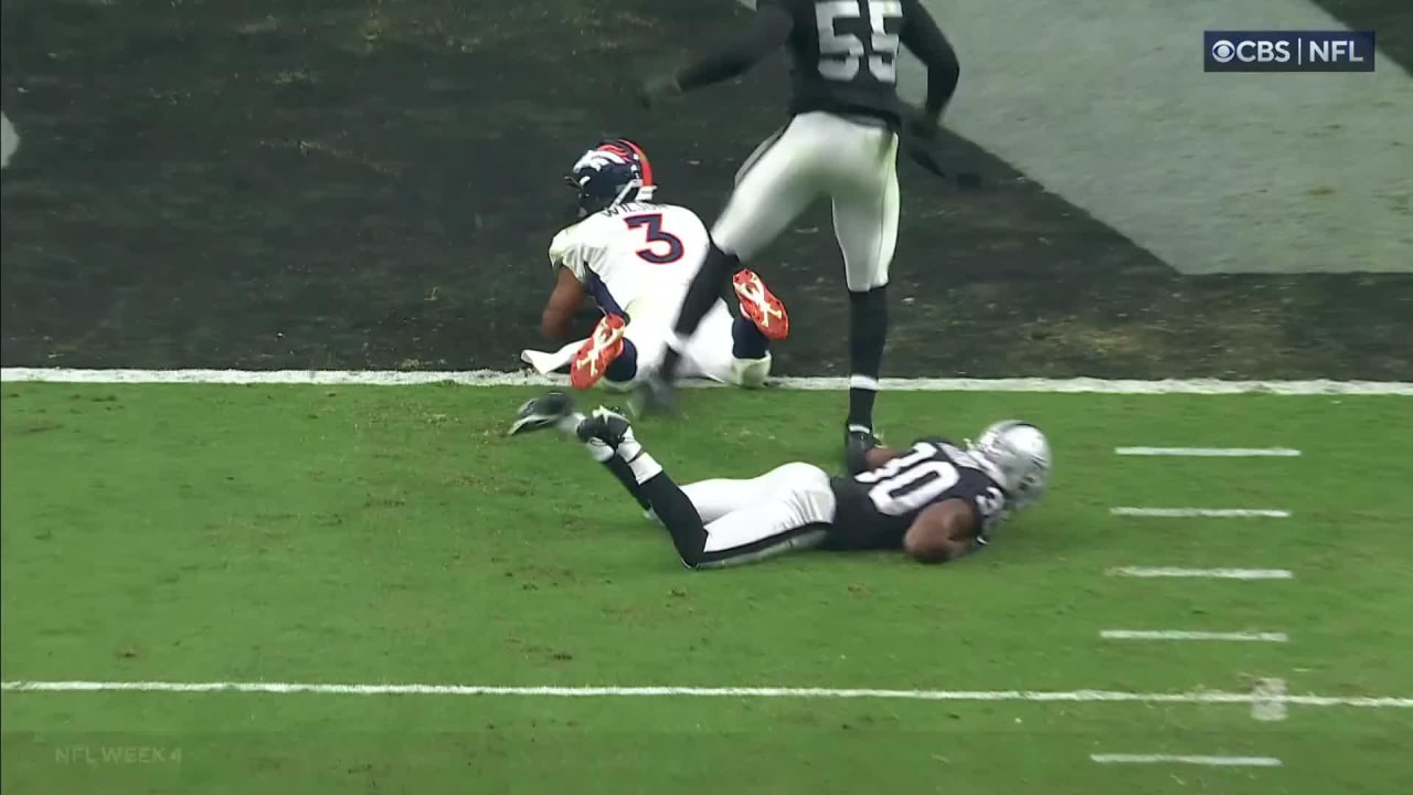 Denver Broncos quarterback DangeRuss keeps it on zone-read play for TD run