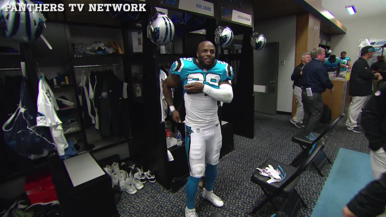 Carolina Panthers head coach Ron Rivera hands out game ball to ...