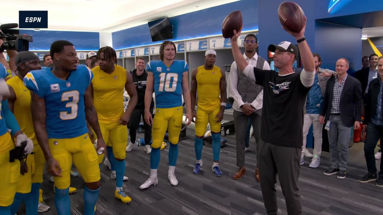 Los Angeles Chargers head coach Brandon Staley hands out game ball ...
