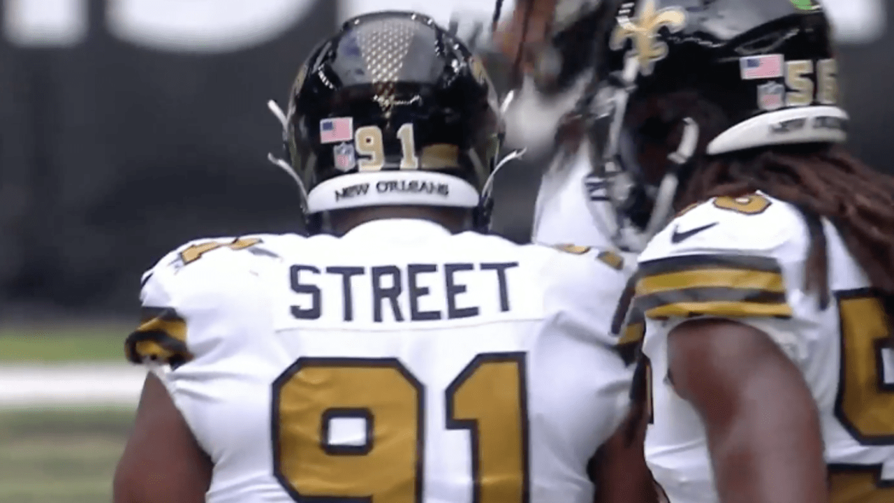 New Orleans Saints defensive end Kentavius Street moves lineman out of ...