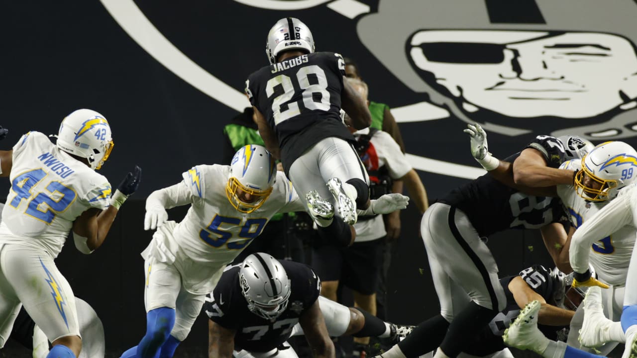 Las Vegas Raiders running back Josh Jacobs dives over goal-line pileup ...