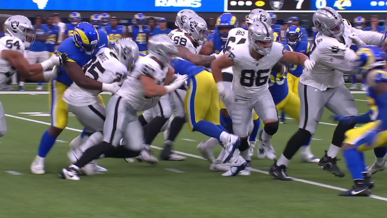 Los Angeles Rams defensive tackle Bobby Brown III beats Raiders' offensive lineman inside for ...