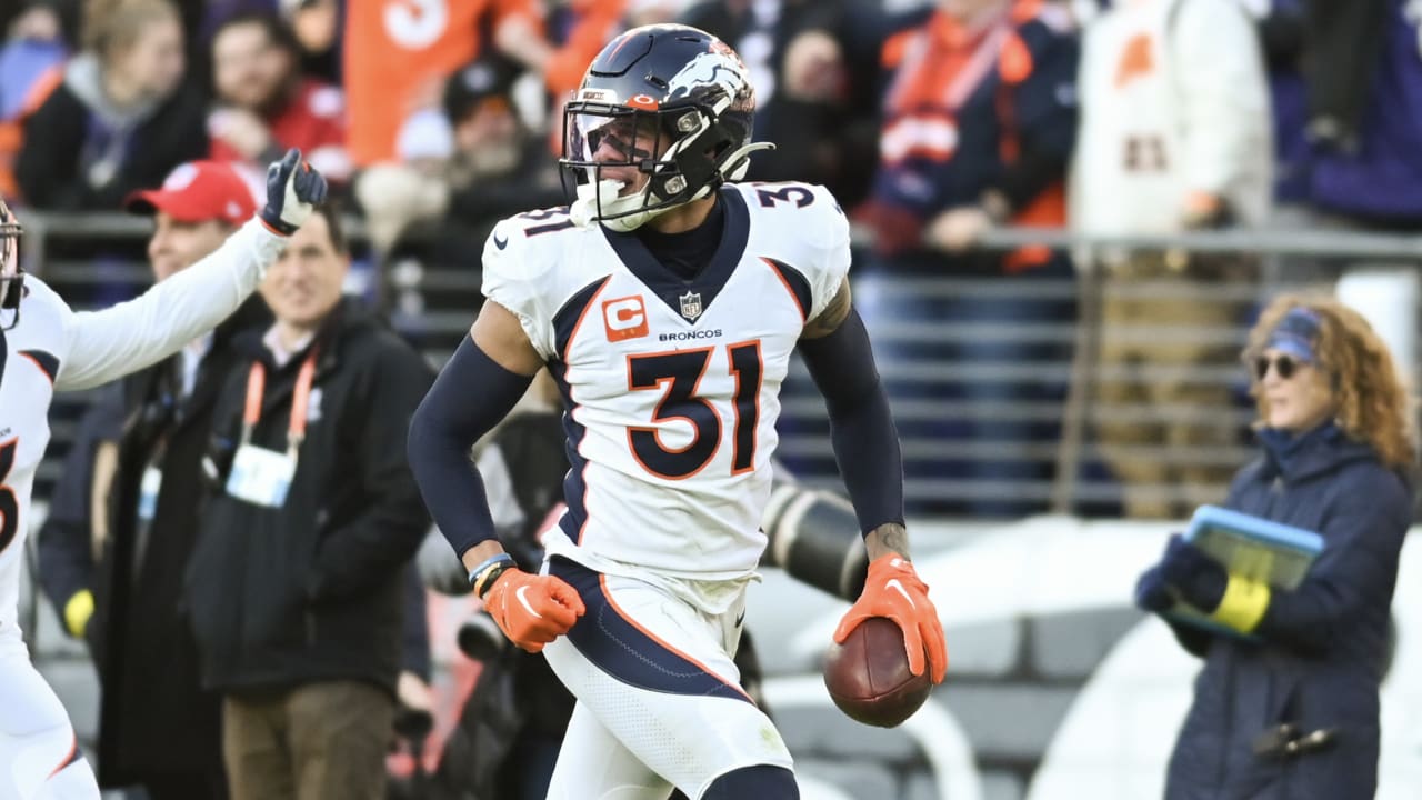 Denver Broncos safety Justin Simmons straddles sideline for INT of ...