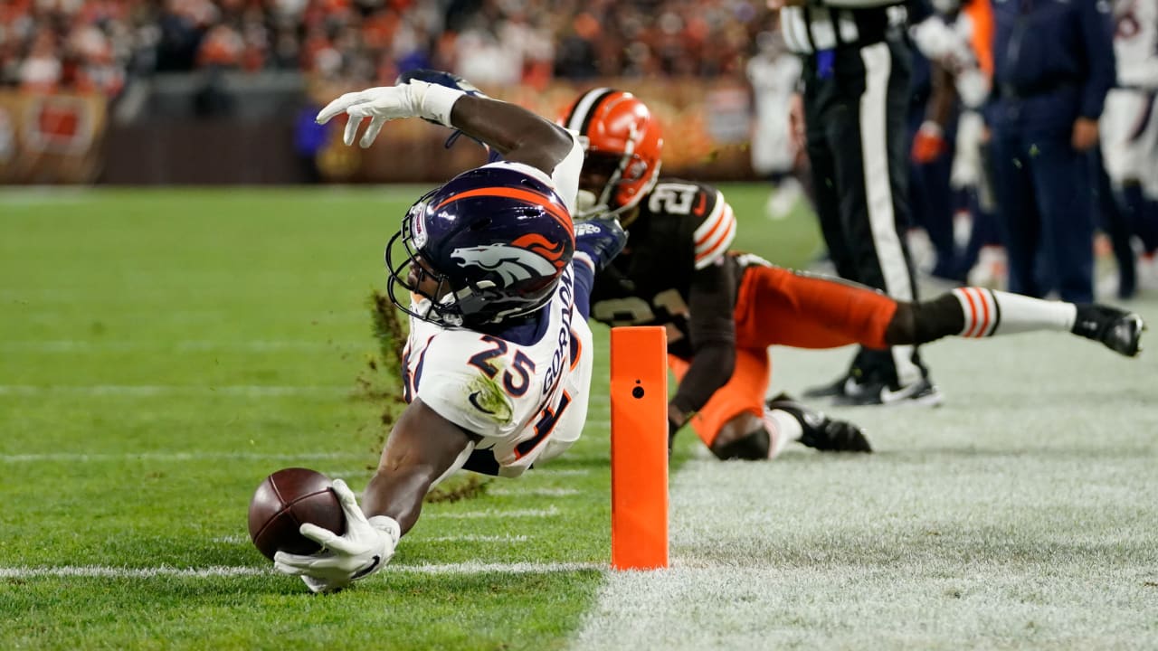 Denver Broncos running back Melvin Gordon dives at the pylon for an ...