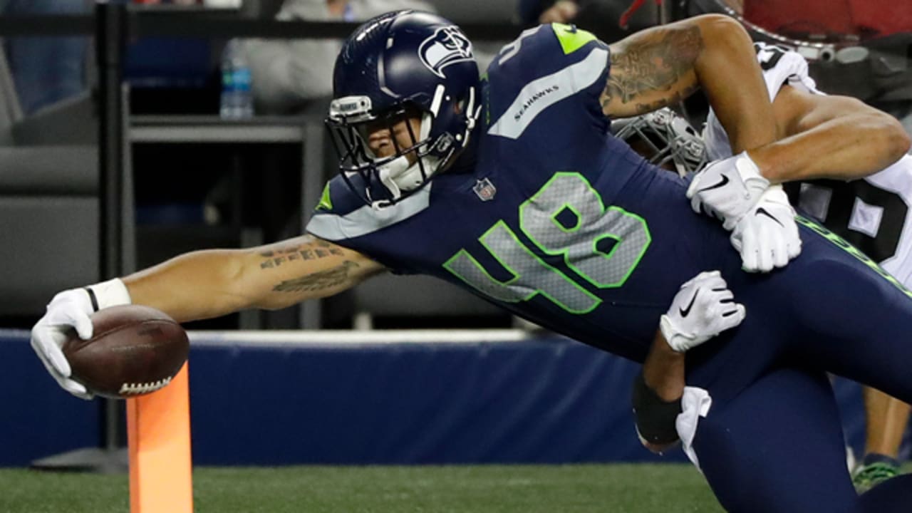 Kyle Carter reaches for the pylon for 10-yard touchdown