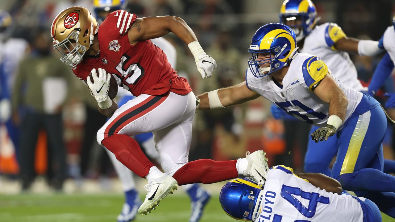 San Francisco 49ers running back Elijah Mitchell takes toss play for a ...