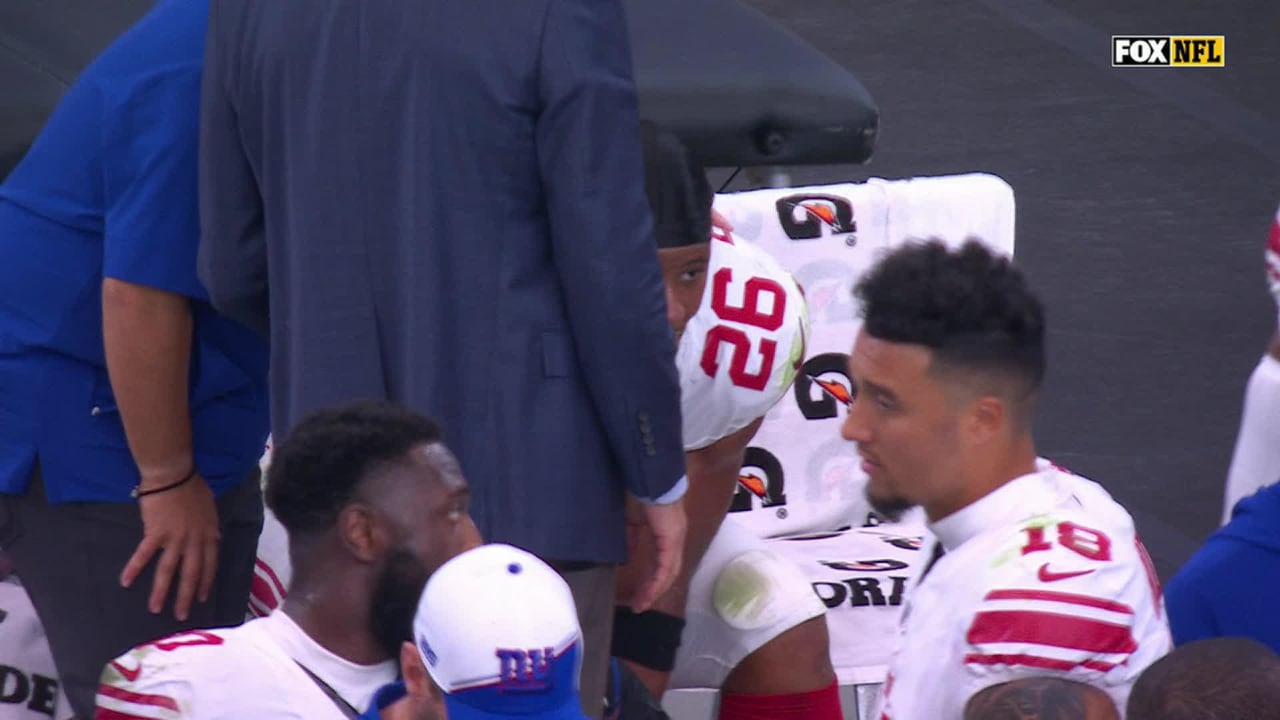 New York Giants running back Saquon Barkley slams helmet to ground on ...