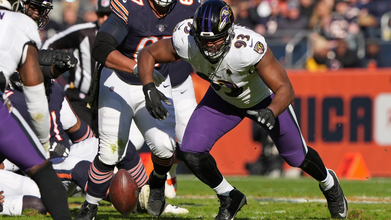 Baltimore Ravens defensive lineman Calais Campbell scoops up fumble by ...