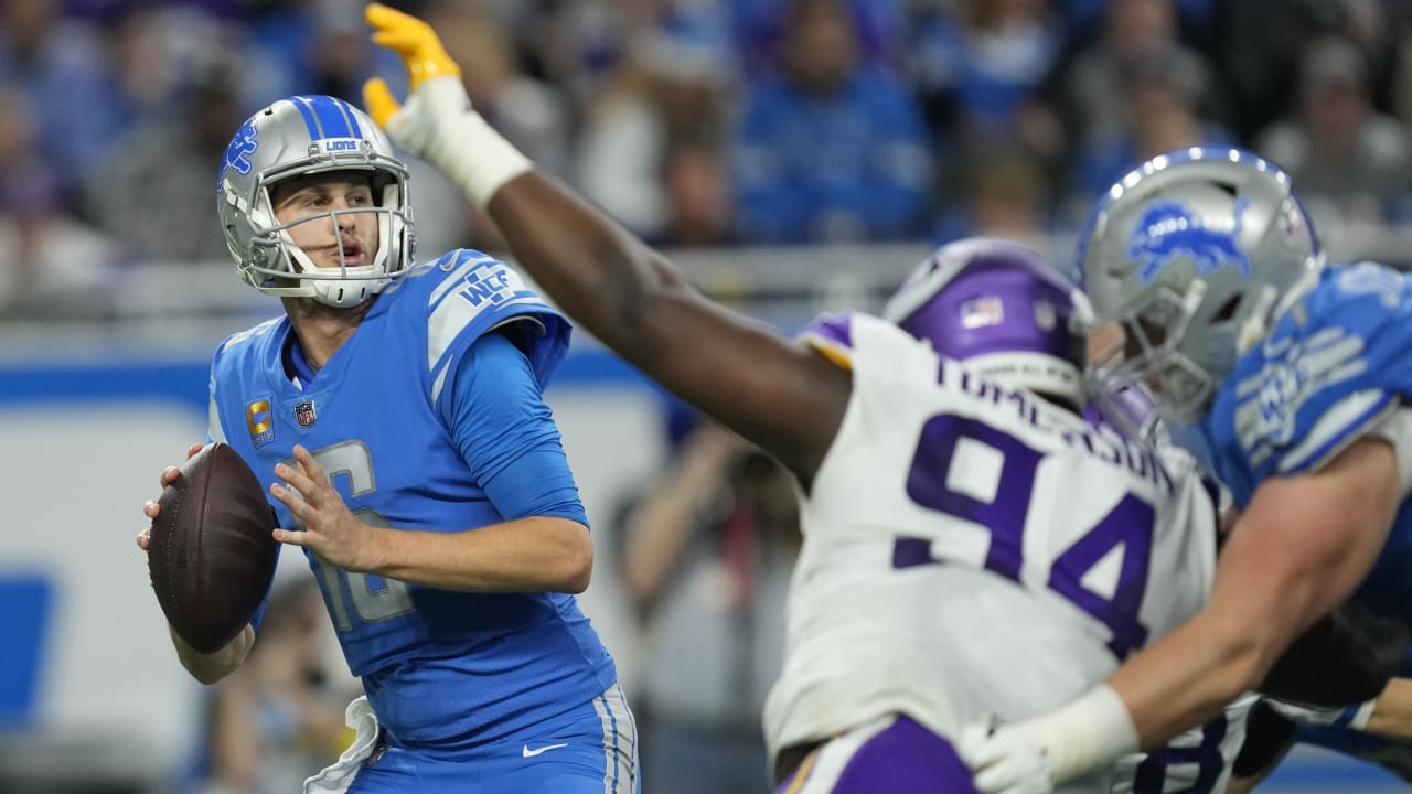 Detroit Lions quarterback Jared Goff dots wide receiver Amon-Ra St ...