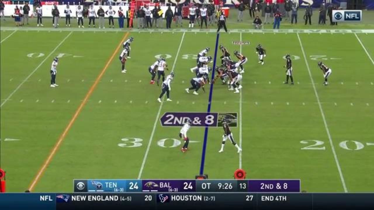 Defenders swarm Baltimore Ravens quarterback Lamar Jackson for ...