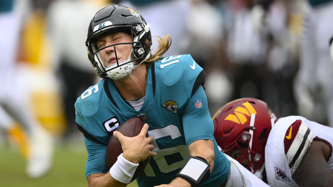 Washington Commanders defensive end Jonathan Allen charges past block ...