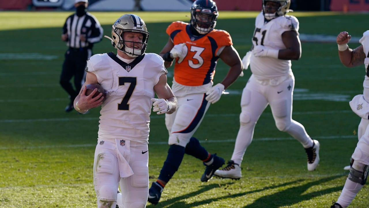 New Orleans Saints quarterback Taysom Hill follows offensive tackle ...