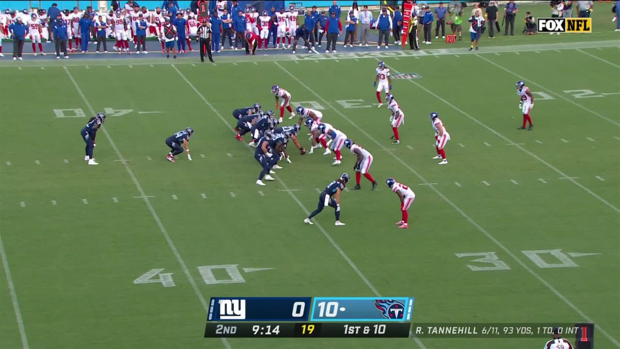 Tennessee Titans quarterback Ryan Tannehill dots tight end Cody ...