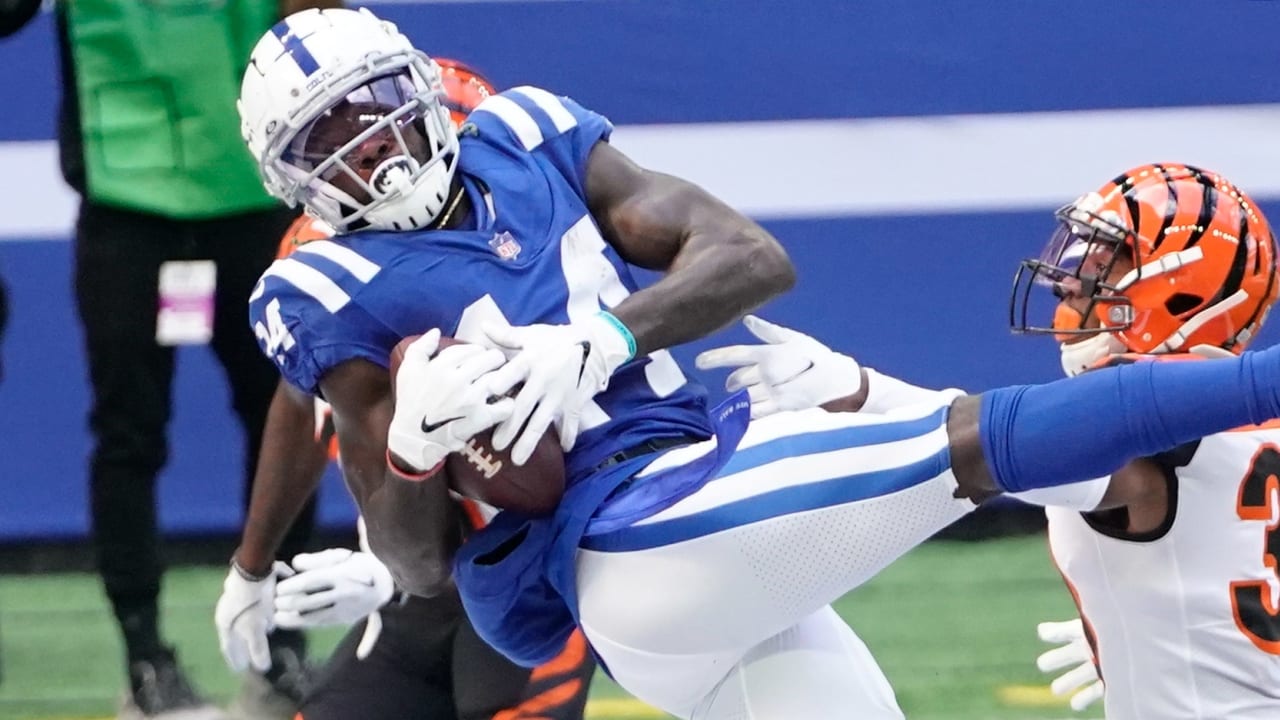 Indianapolis Colts wide receiver Zach Pascal twists his body at the ...