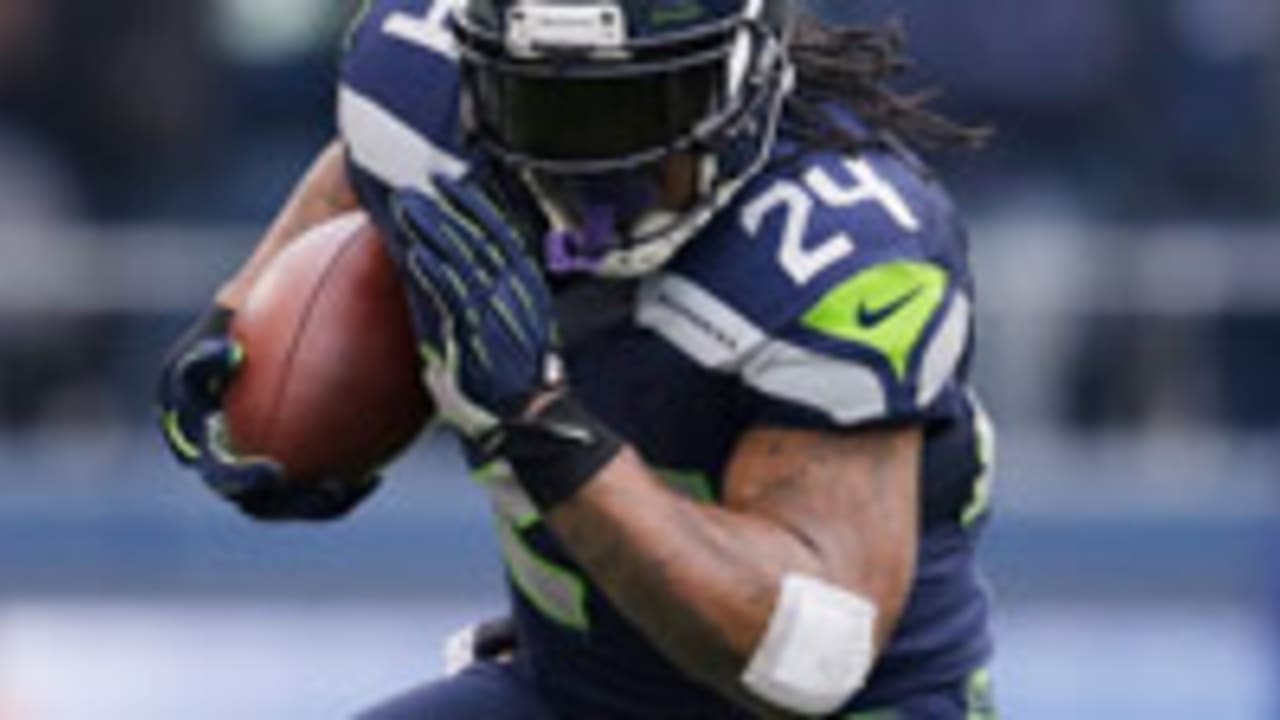 Marshawn Lynch attends Super Bowl XLVIII Media Day