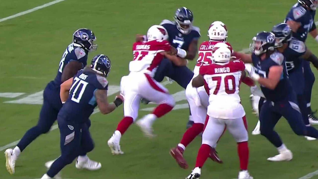 Arizona Cardinals defensive end Cameron Thomas runs over Tennessee ...
