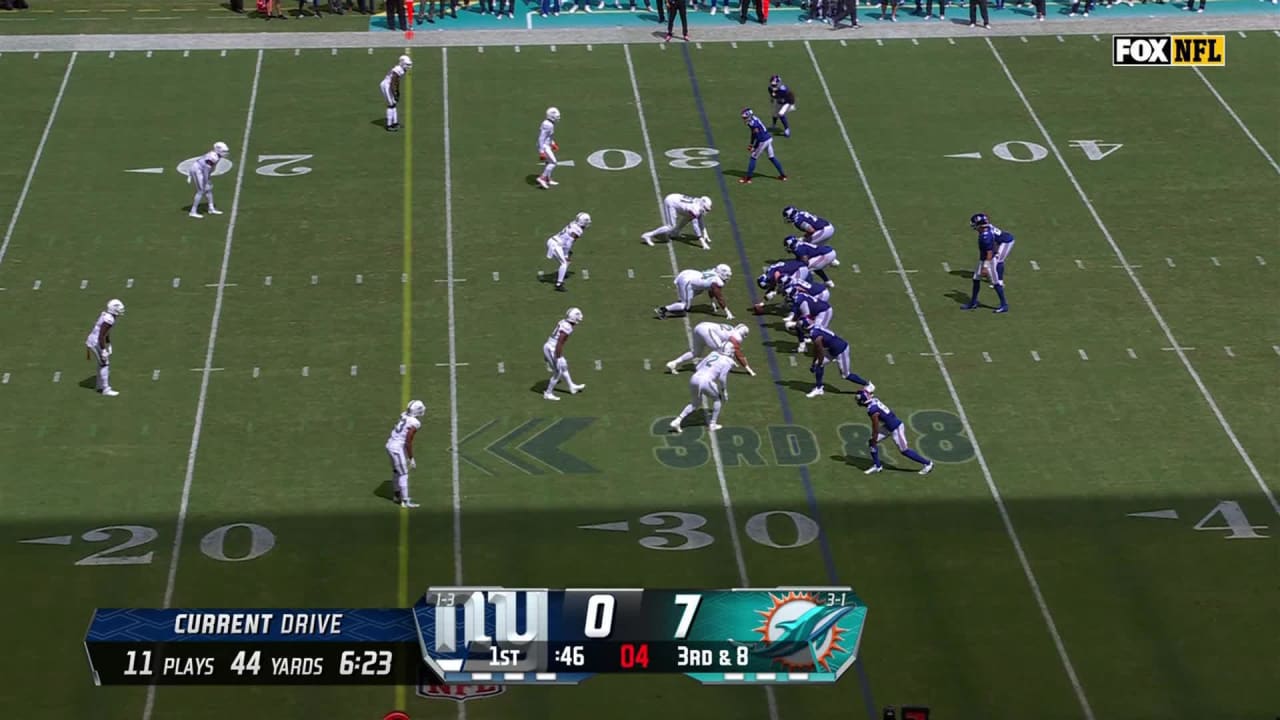 Miami Dolphins' defense swarms Daniel Jones as defensive tackle Christian Wilkins and linebacker ...