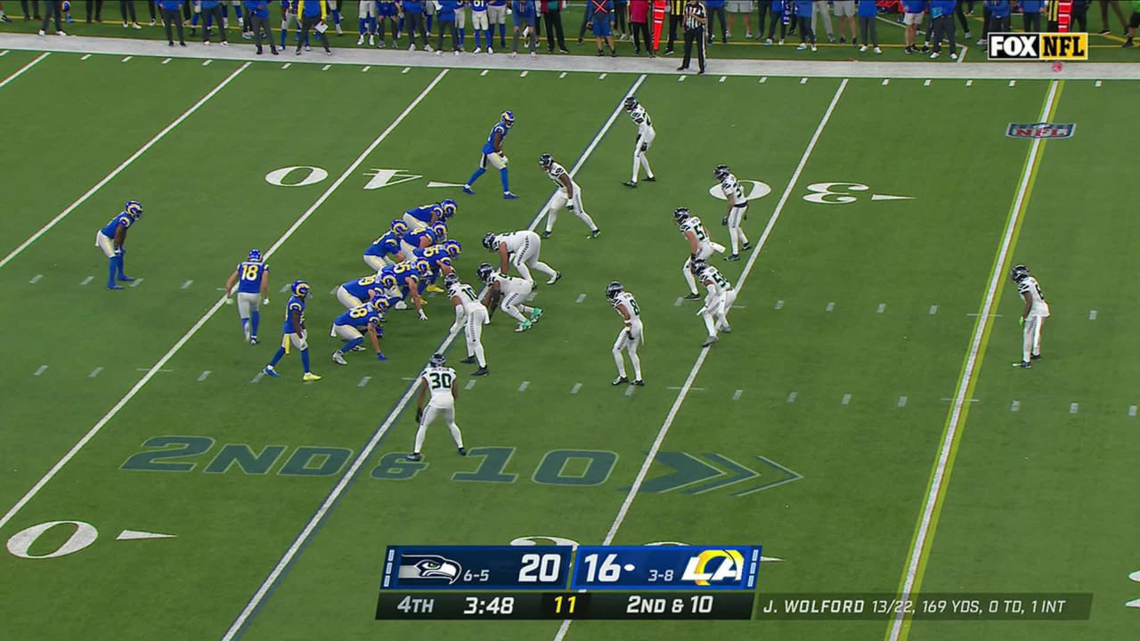 Los Angeles Rams' trap-play handoff to wide receiver Brandon Powell ...