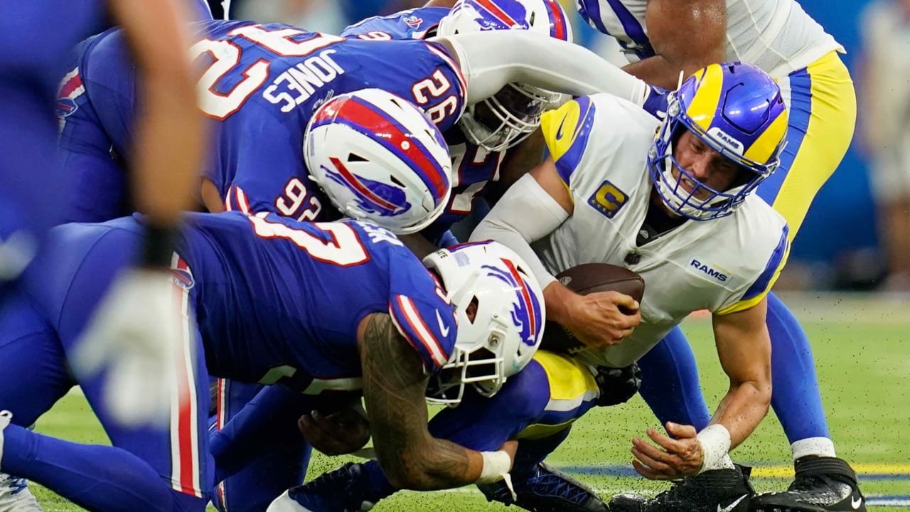 Buffalo Bills defensive lineman Jordan Phillips leads a swarm of Bills ...