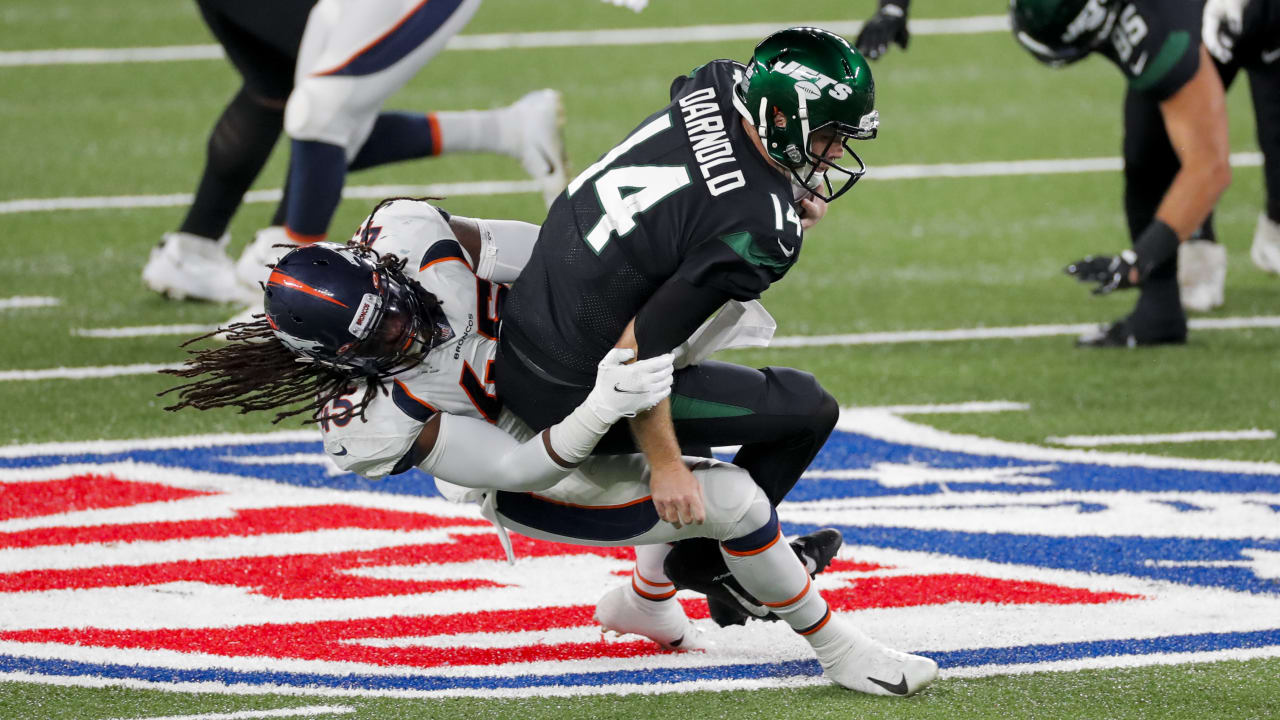 Sam Darnold comes up injured after Alexander Johnson sack