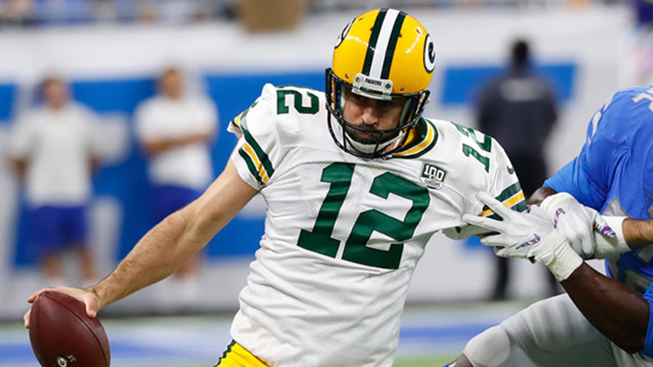 Rodgers uses impressive stiff arm to fight for first down