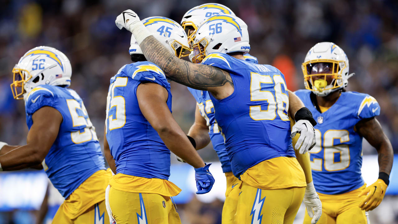 Los Angeles Chargers defensive lineman Morgan Fox corrals Dallas ...
