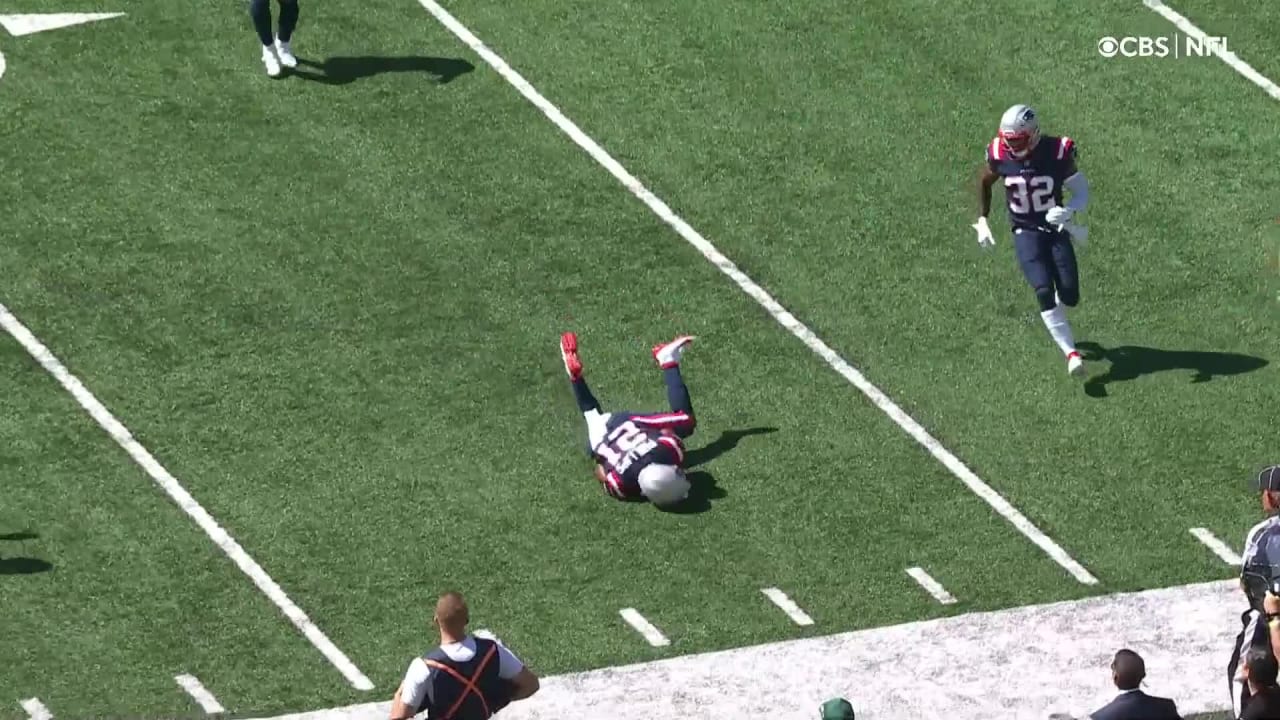 New England Patriots defensive back Adrian Phillips lays out to pick ...