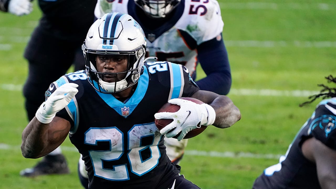 Carolina Panthers running back Mike Davis sifts through traffic on ...