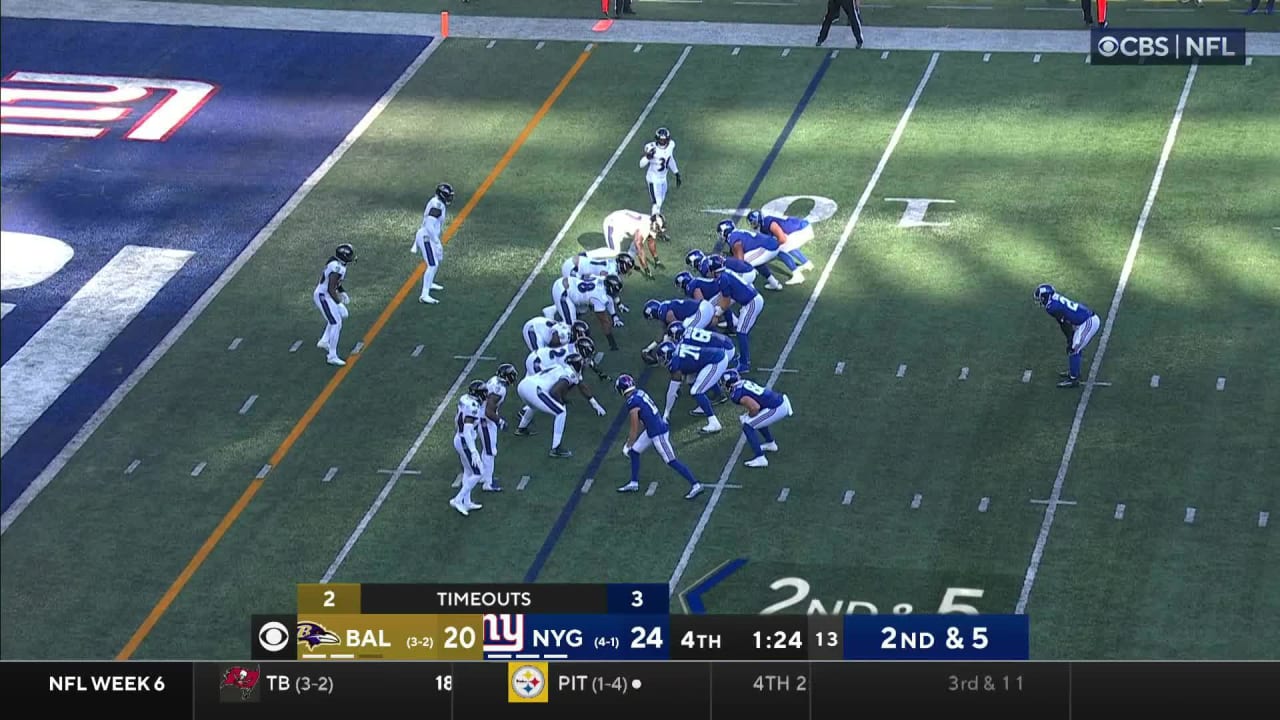 New York Giants running back Saquon Barkley slides down before the goal ...