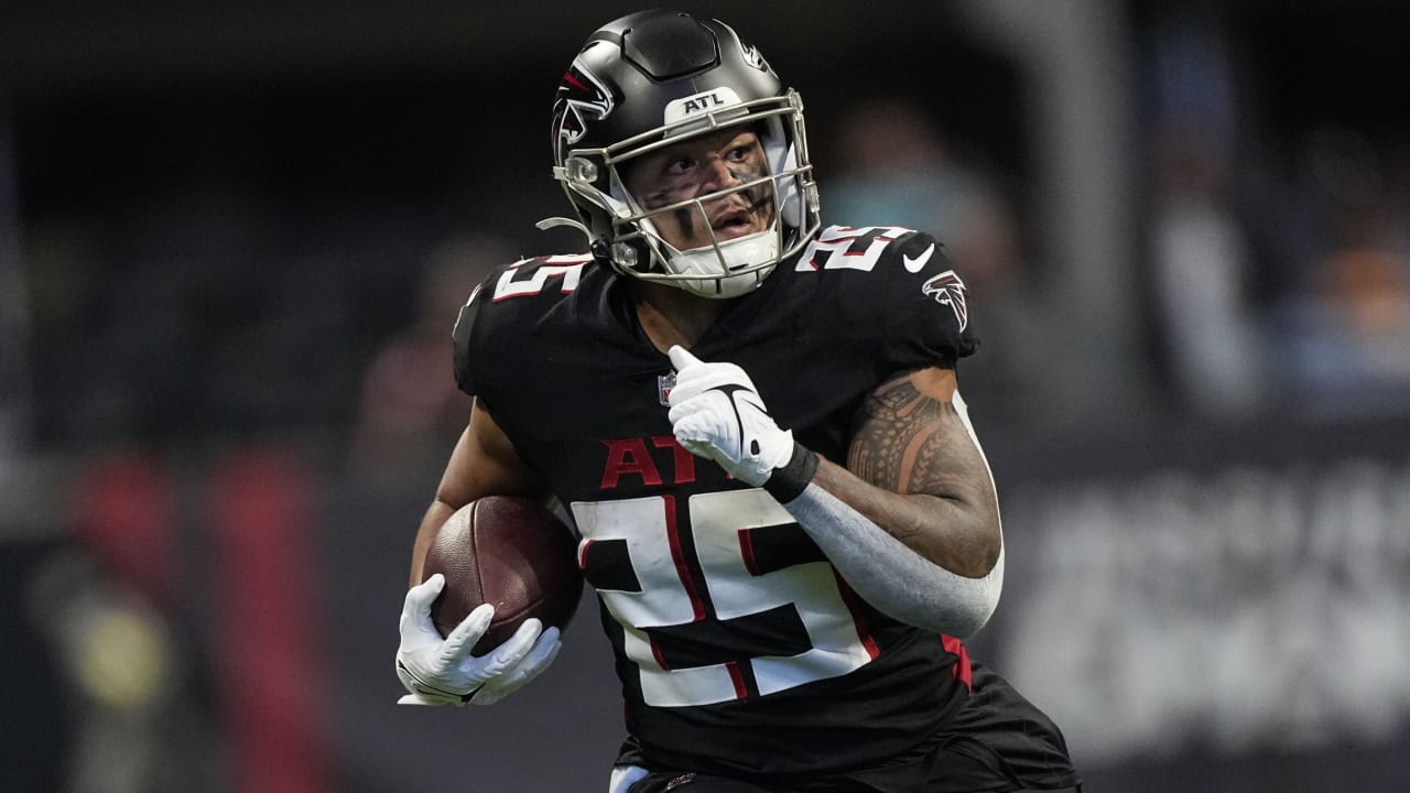 Atlanta Falcons running back Tyler Allgeier explodes up the middle on ...
