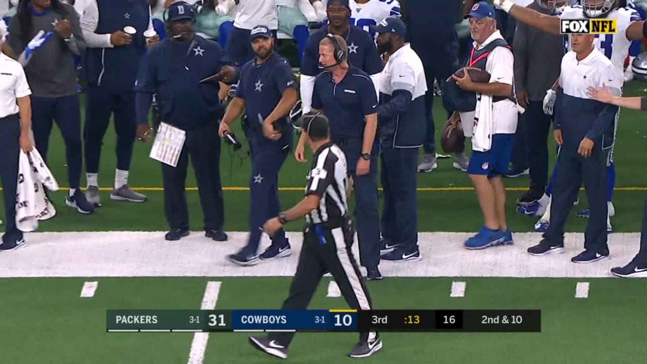Jason Garrett penalized after throwing down challenge flag