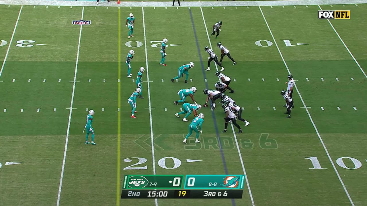 Miami Dolphins defensive back Keion Crossen pancakes Wilson into ground ...