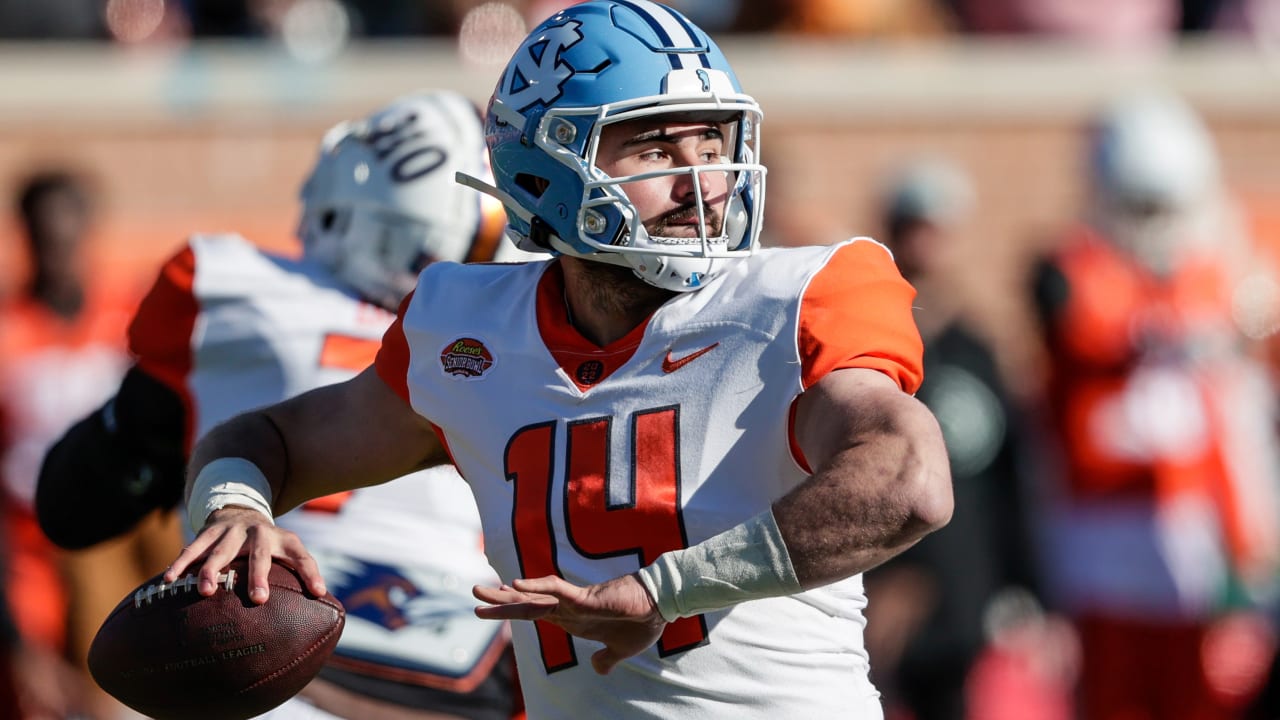 North Carolina Tar Heels quarterback Sam Howell avoids an unblocked ...