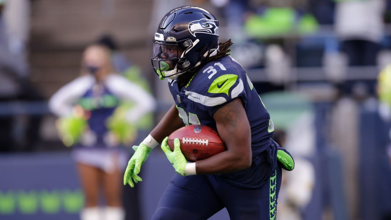 Seattle Seahawks running back DeeJay Dallas powers through goal line for TD