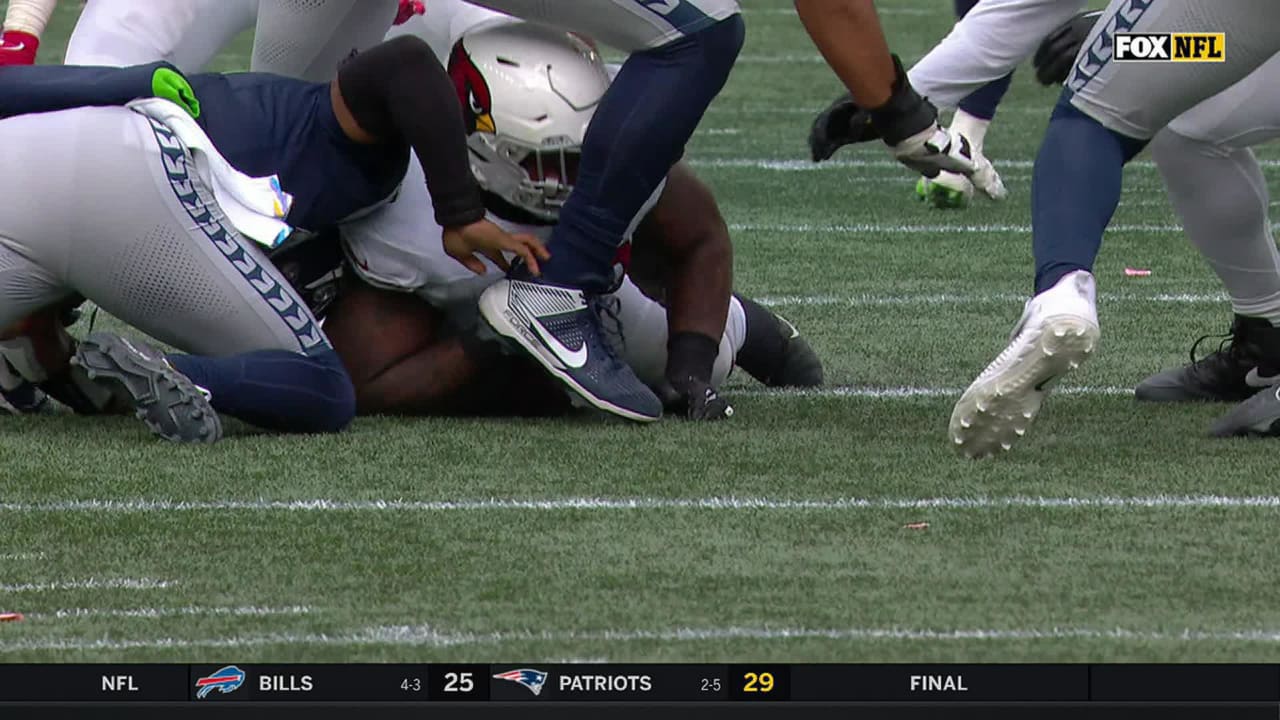 Arizona Cardinals defensive lineman Kevin Strong recovers fumbled snap ...
