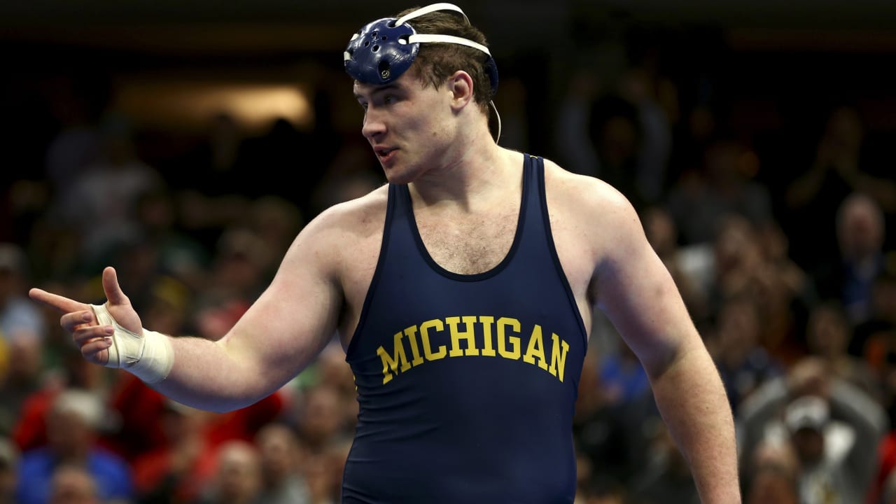 Titans signing former world champion wrestler Adam Coon to play OL