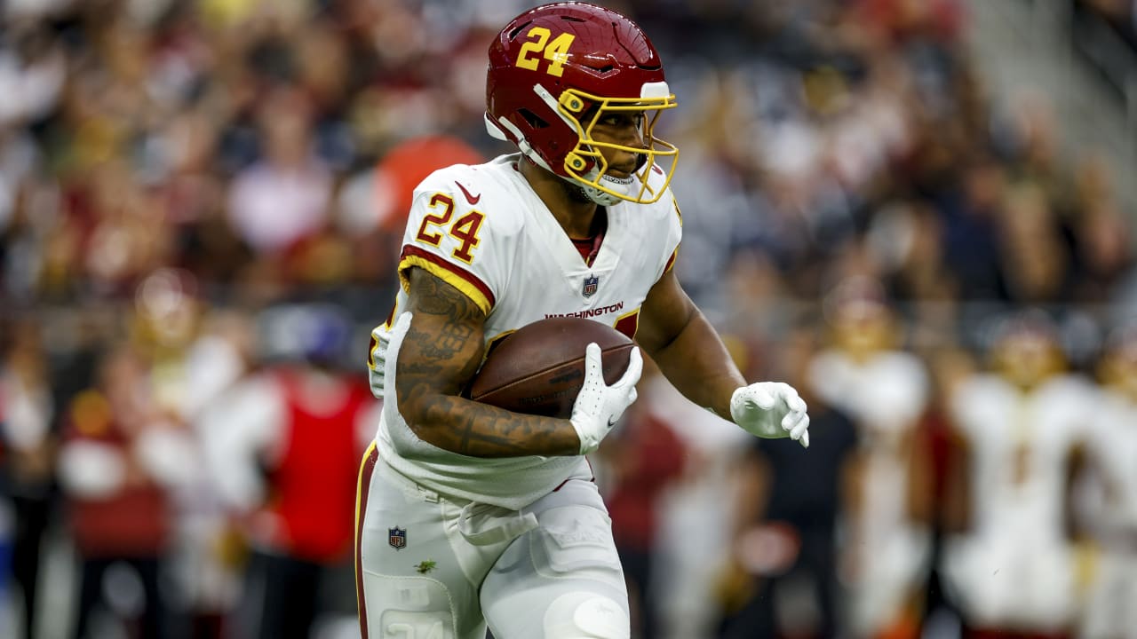 Washington Football Team running back Antonio Gibson bursts off right ...